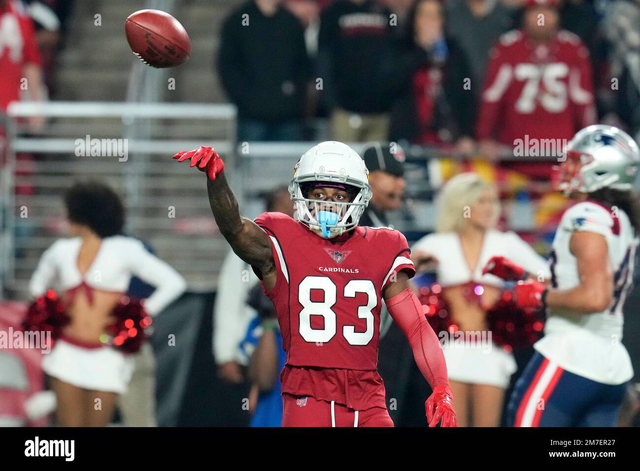 Arizona Cardinals wide receiver Greg Dortch flips the ball to an ...