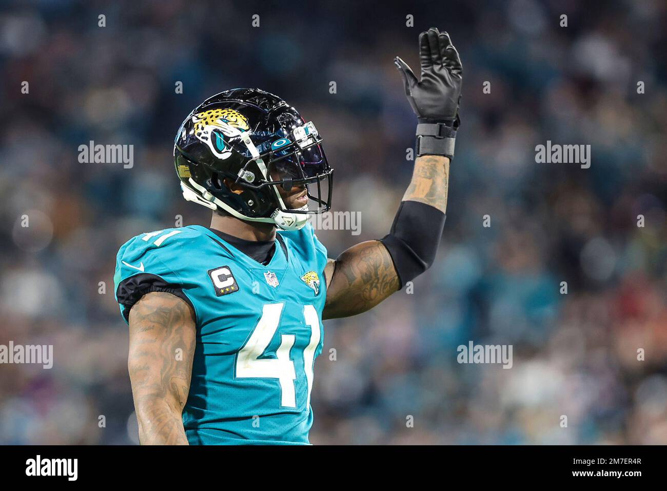 Jacksonville Jaguars linebacker Josh Allen (41) gestures to the stands ...