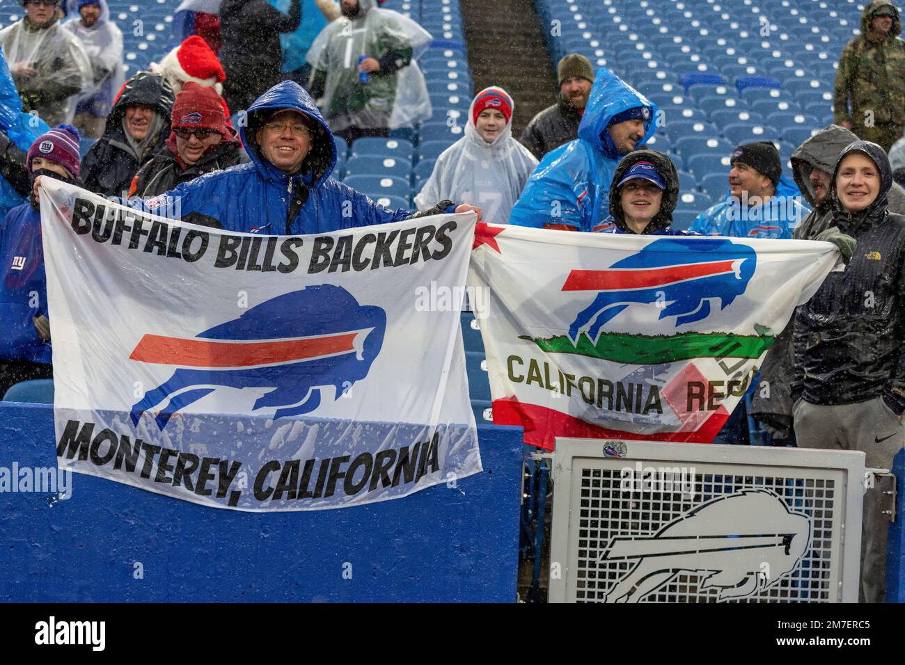 Buffalo Bills fans from California cheer with signs before the Bills ...