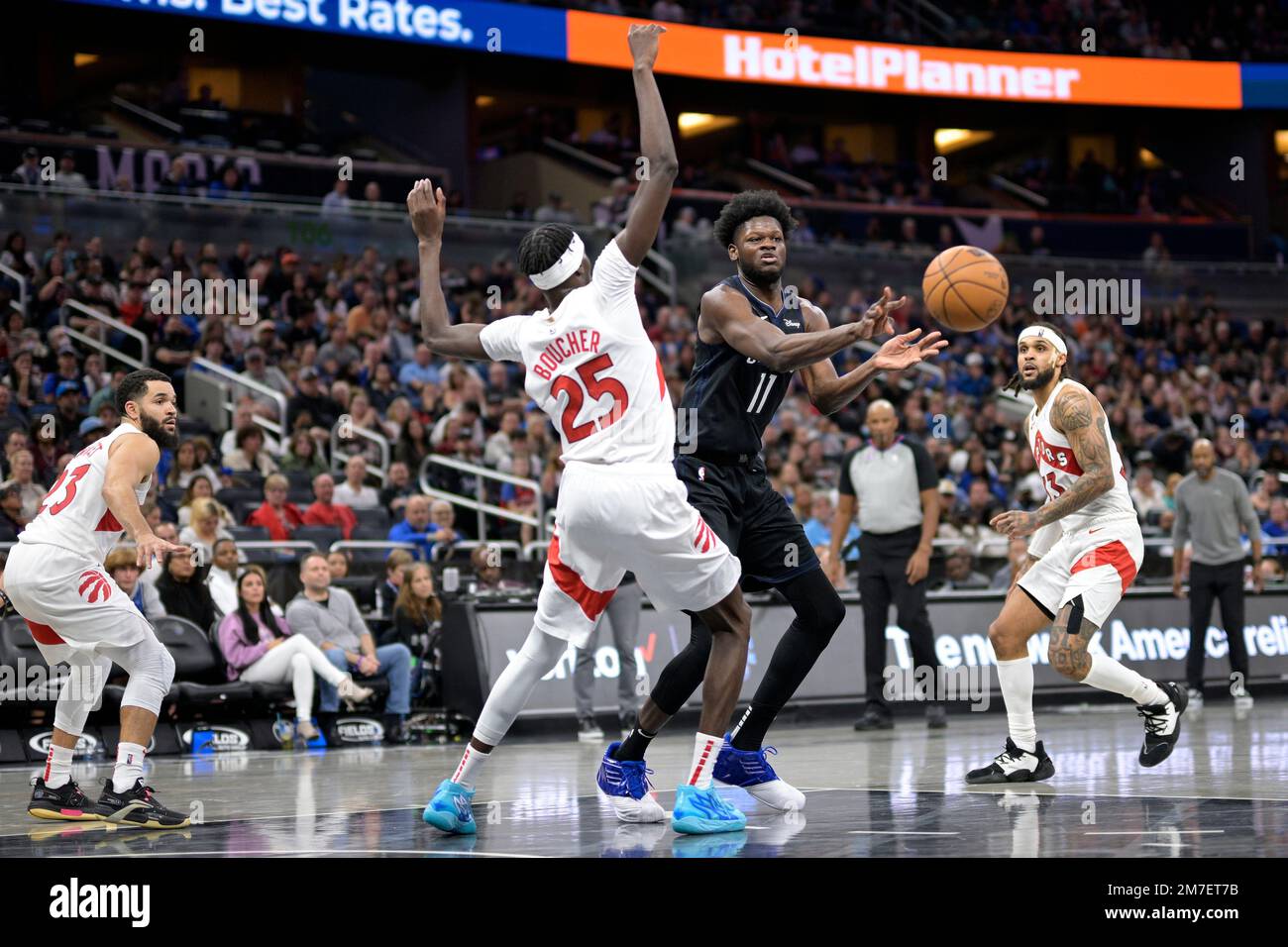 Orlando Magic center Mo Bamba (11) passes the ball in front of Toronto ...
