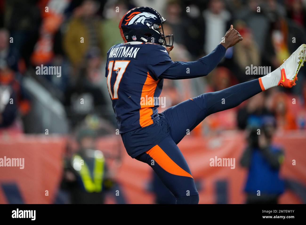 Denver Broncos punter Corliss Waitman (17) in the second half of an NFL ...