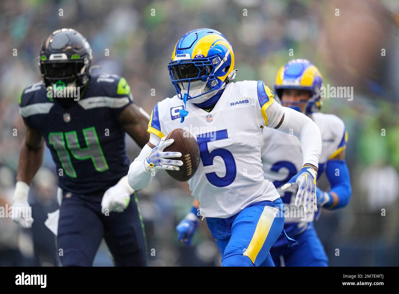 Los Angeles Rams cornerback Jalen Ramsey (5) runs with an intercepted ...
