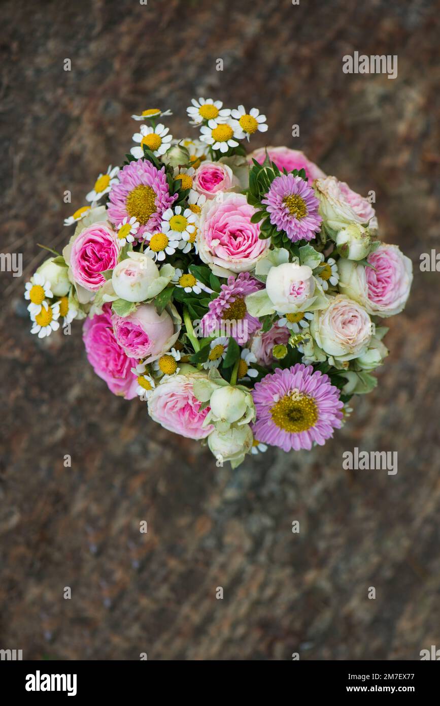 Little flower bouquet with pink roses Stock Photo - Alamy
