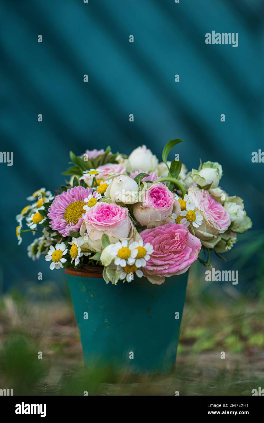 Little flower bouquet with pink roses Stock Photo - Alamy