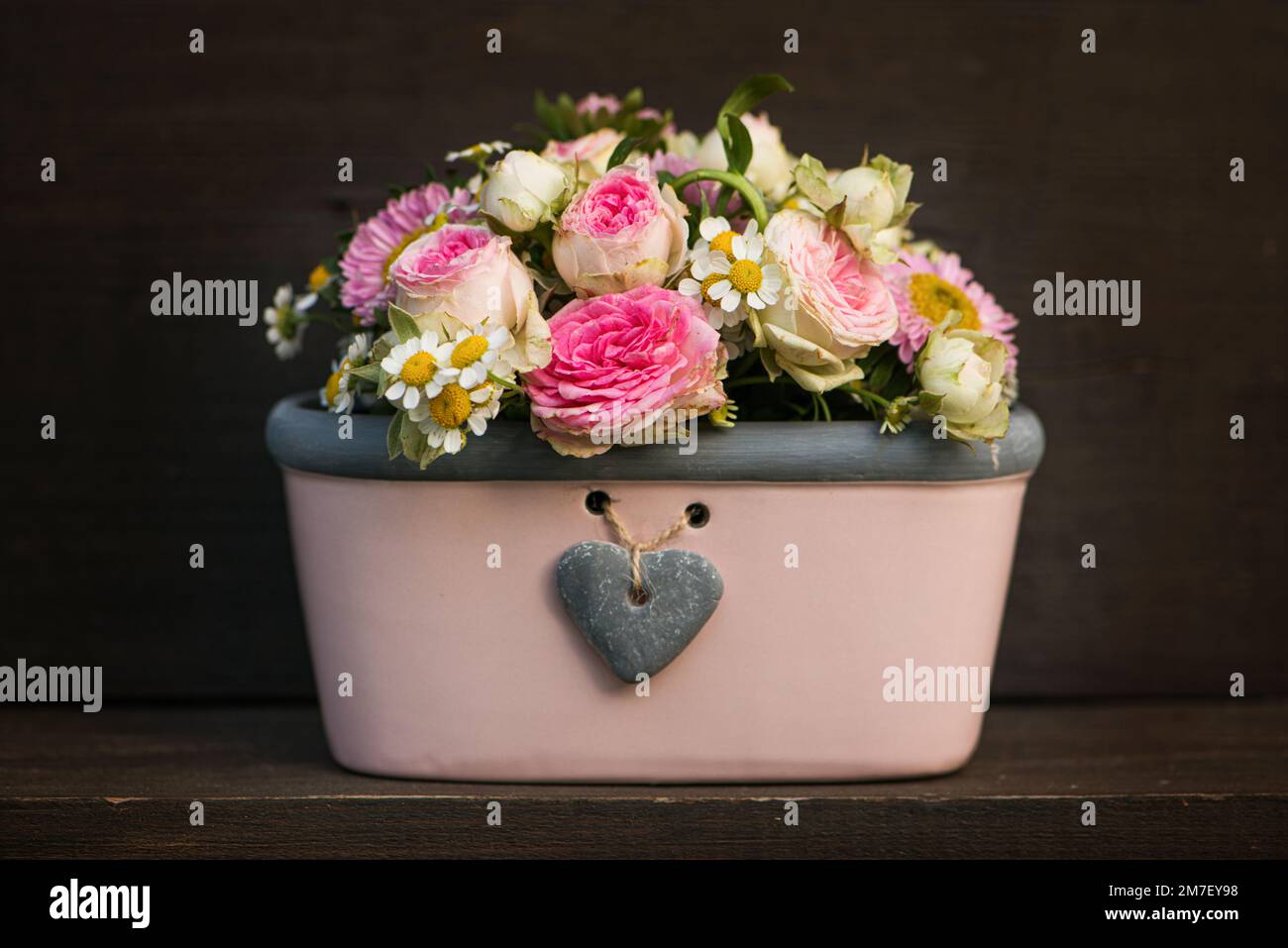 Little flower bouquet with pink roses Stock Photo - Alamy