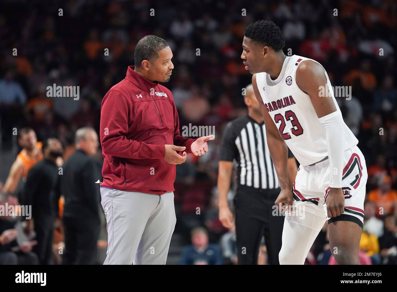South Carolina head coach Lamont Paris, left, communicates with South ...