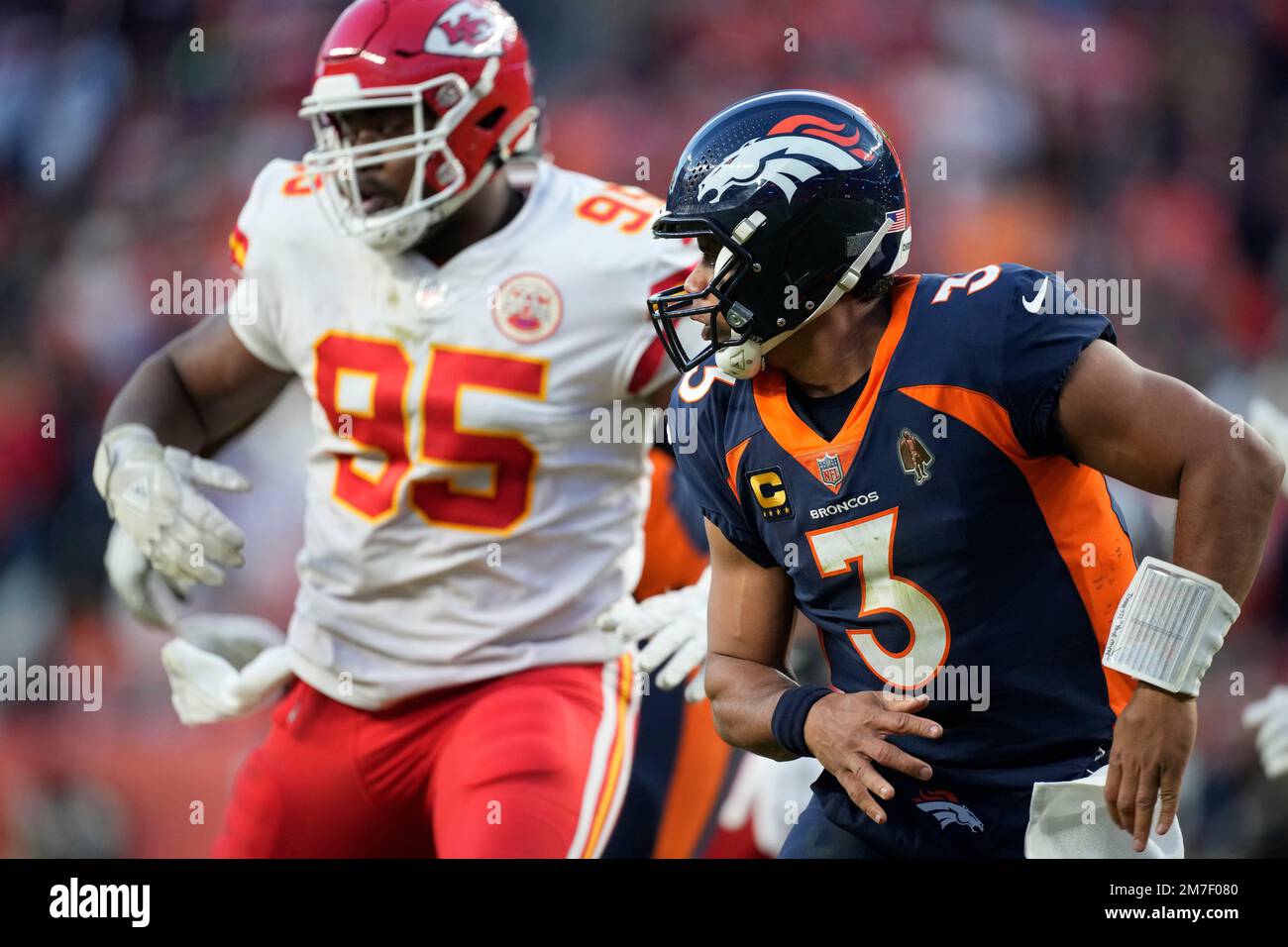 Denver Broncos quarterback Russell Wilson (3) and Kansas City Chiefs ...