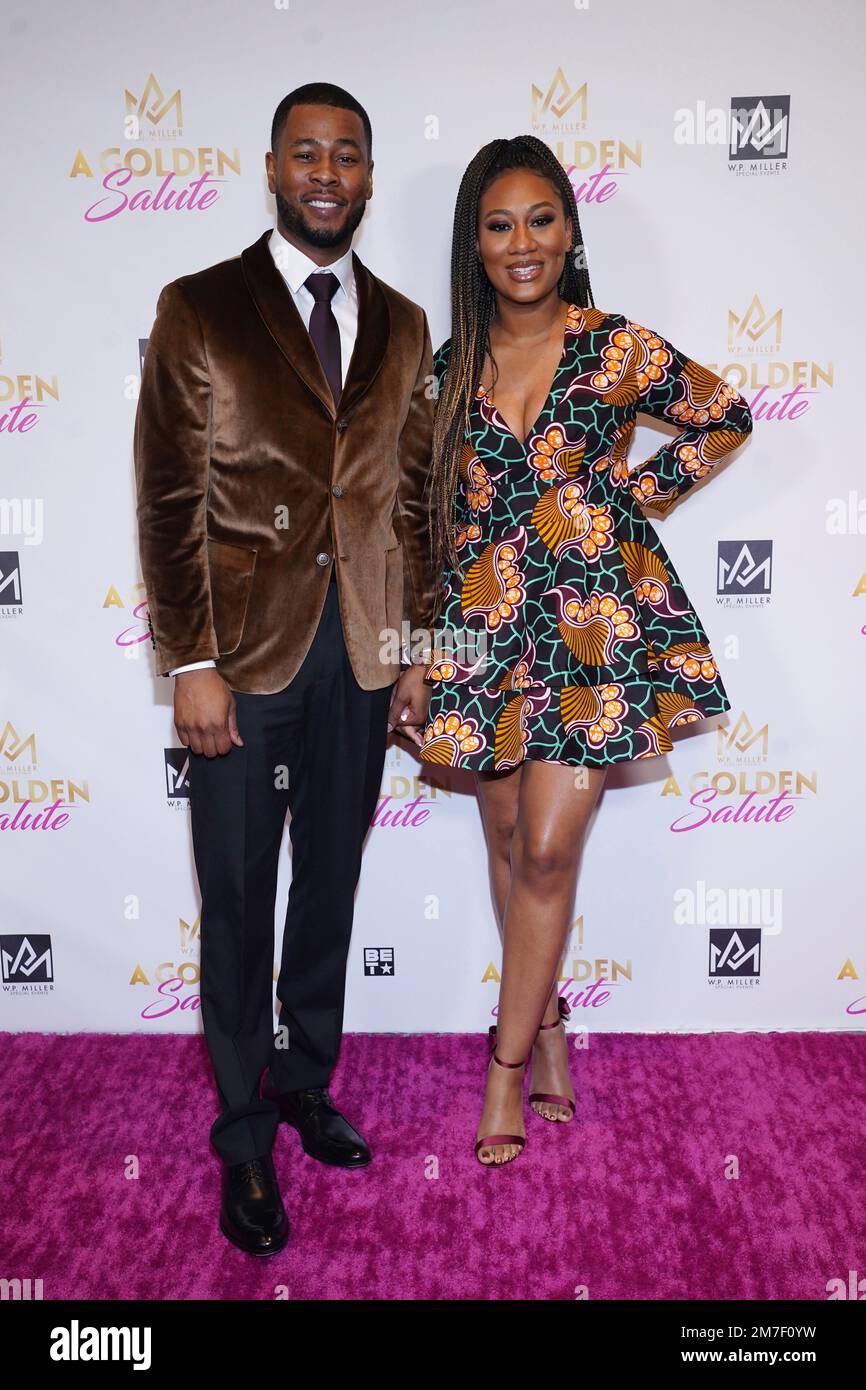 J Alphonse Nicholson, left, and guest arrive at A Golden Salute ...