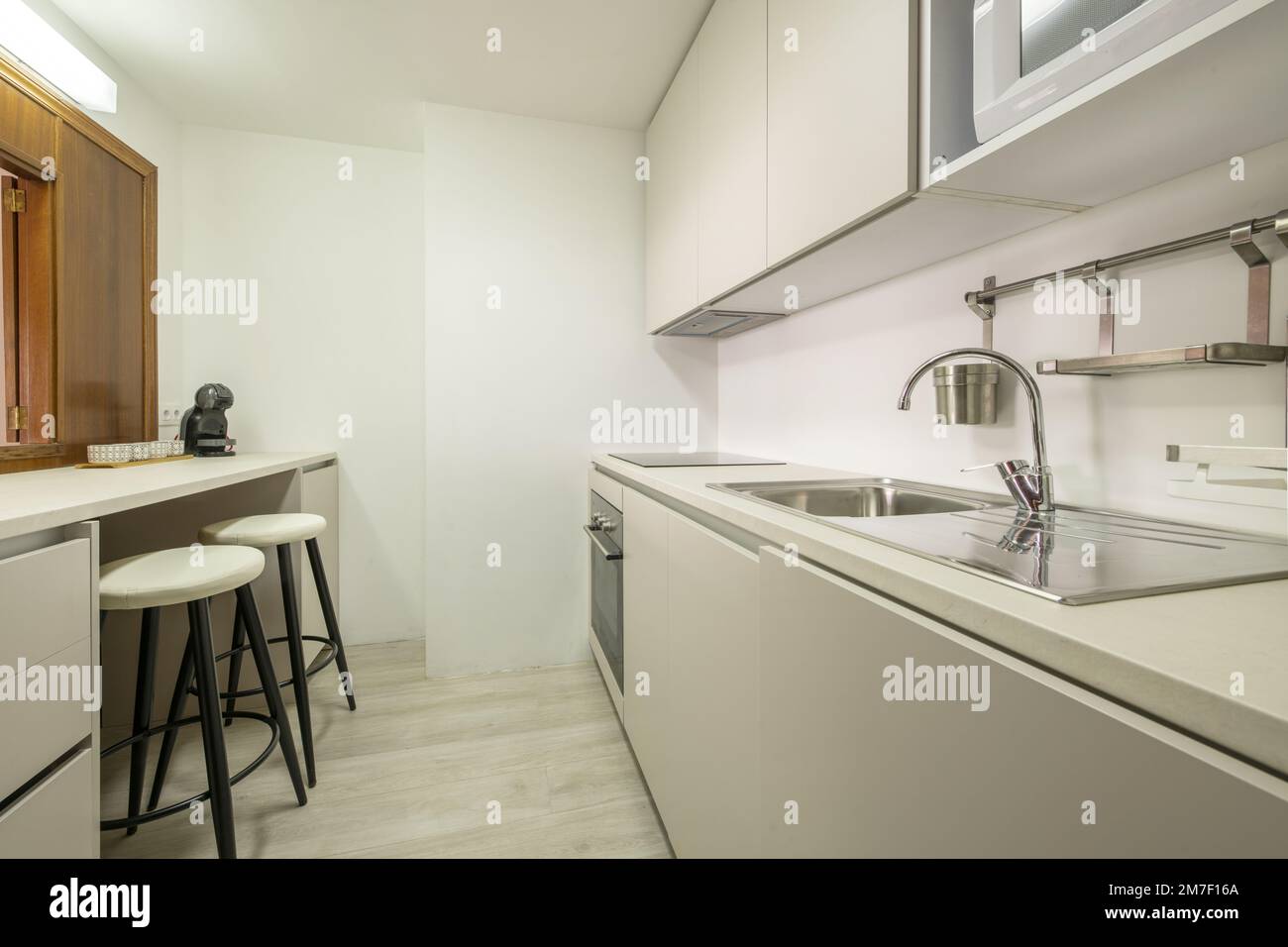 Modern handleless kitchen with sink with stainless steel single-lever ...