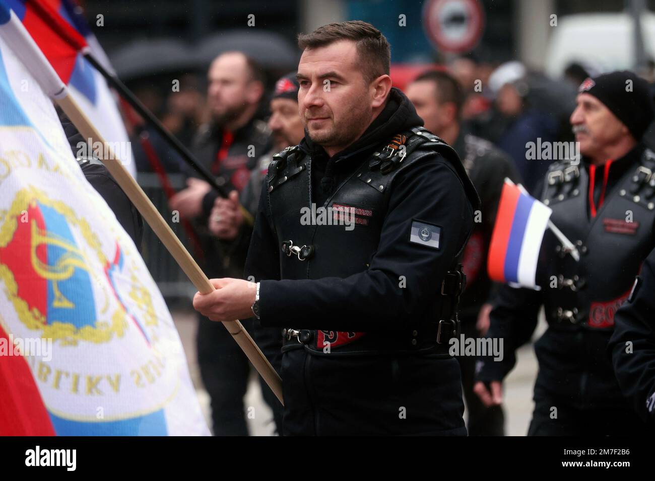 Local members of Russian Night Wolves Motorcycle Club march during a ...