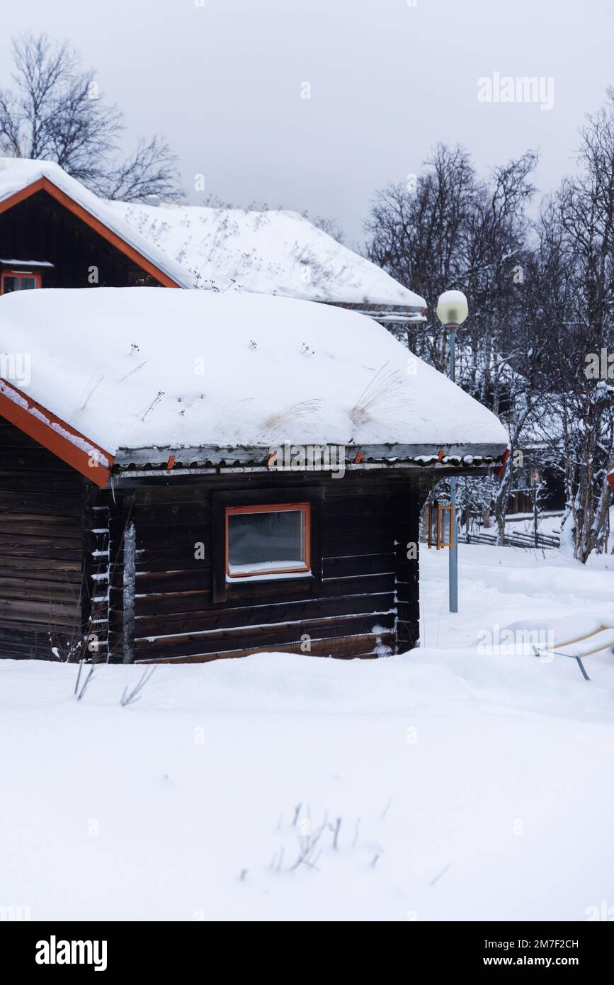 Beautiful little wooden mountain houses, huts surrounded by forest on a ...