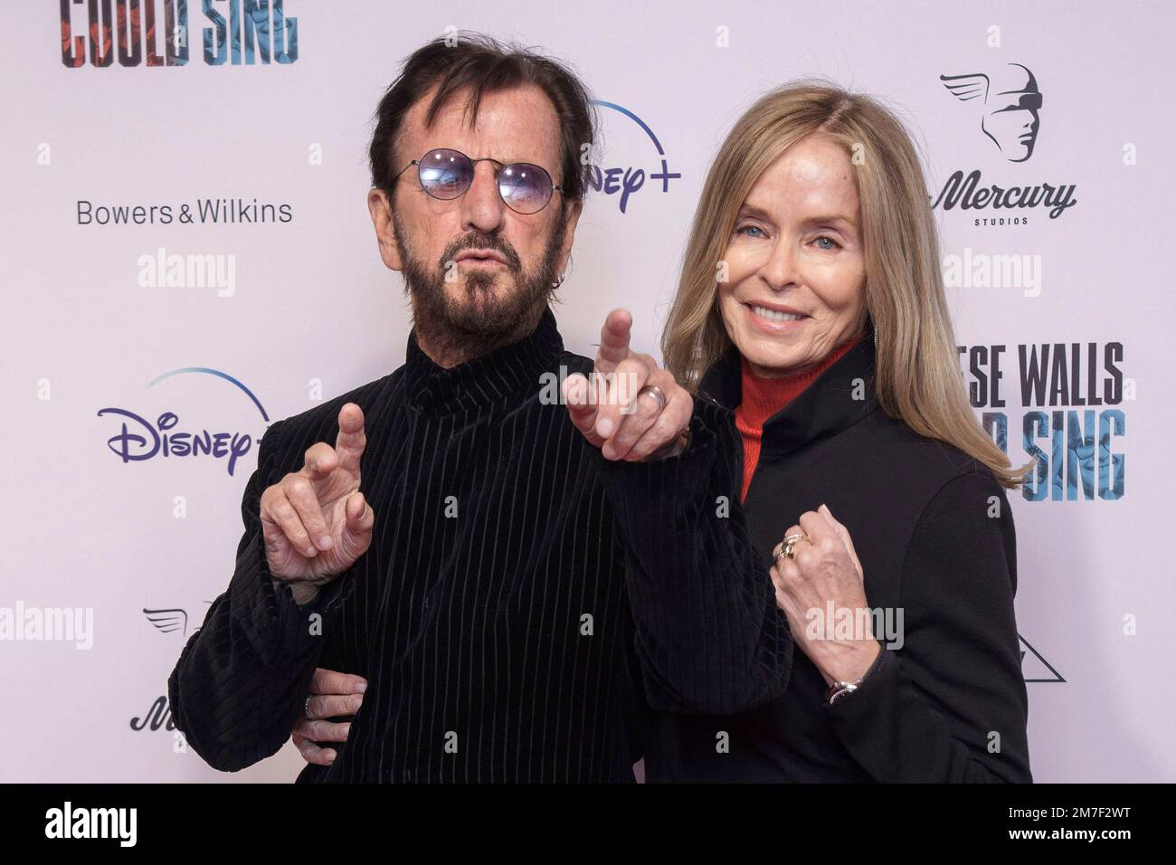 Ringo Starr, left, and Barbara Bach pose for photographers upon arrival ...