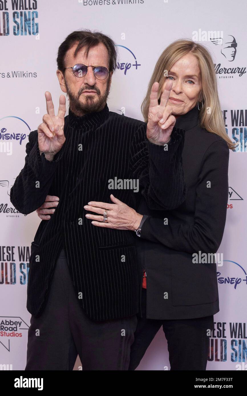 Ringo Starr, left, and Barbara Bach pose for photographers upon arrival ...