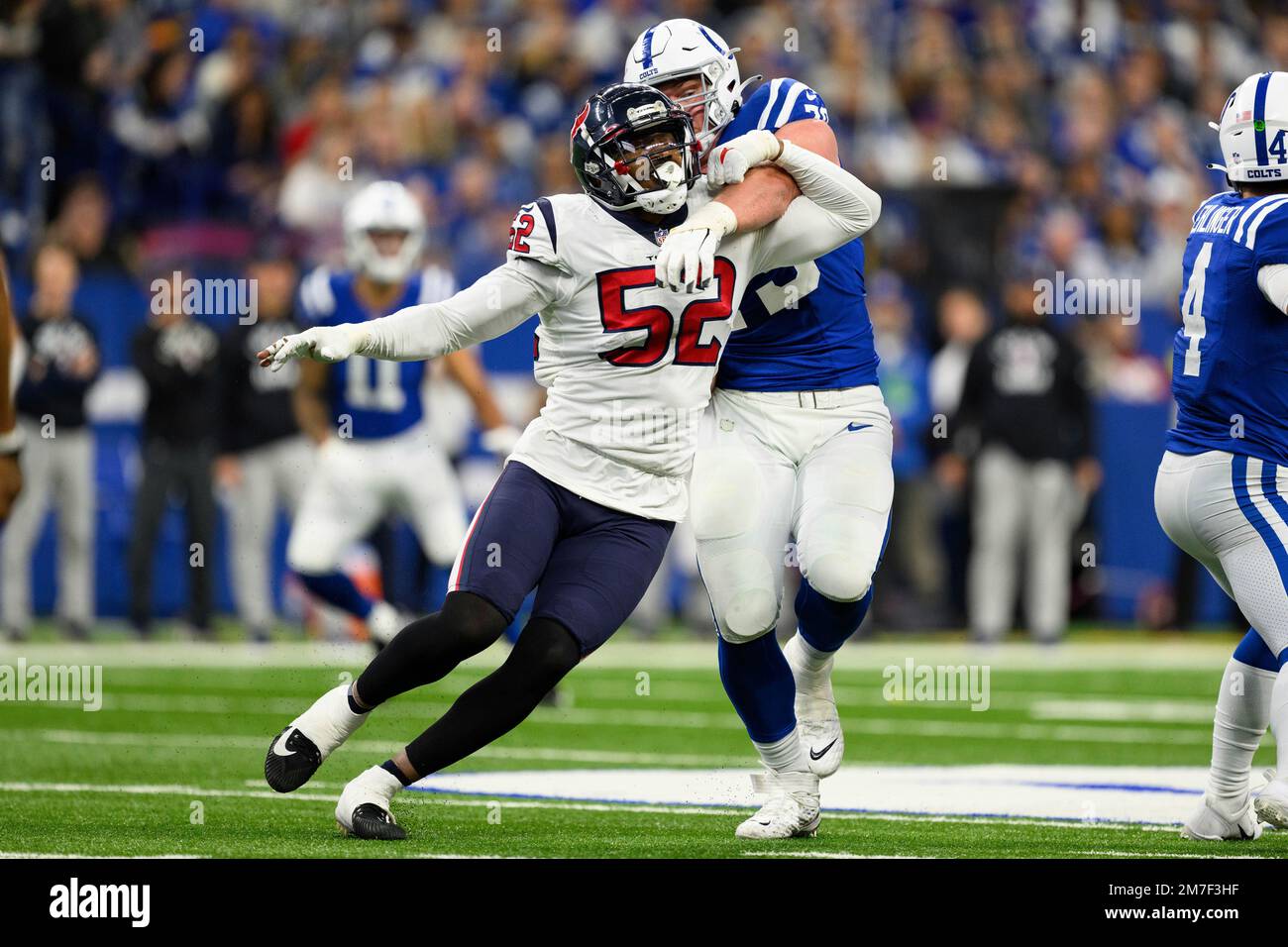 Houston Texans defensive lineman Jonathan Greenard (52) rushes around ...