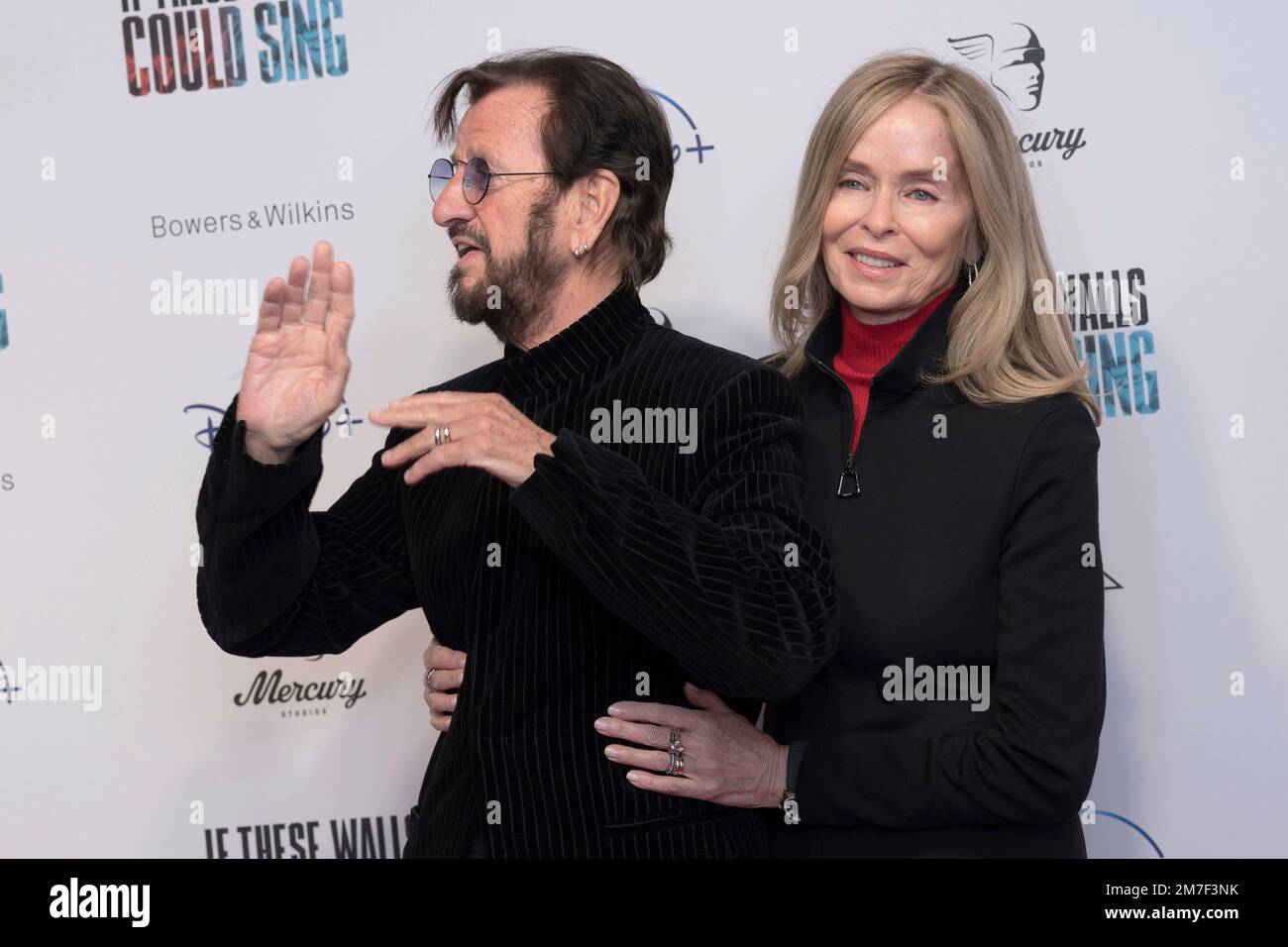 Ringo Starr, left, and Barbara Bach pose for photographers upon arrival ...