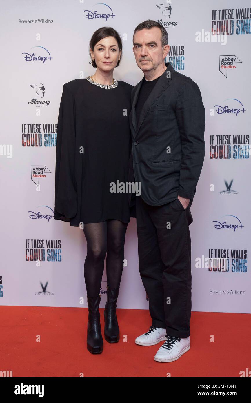 Mary McCartney, left, and Simon Aboud pose for photographers upon ...