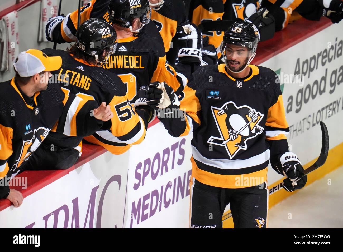 Pittsburgh Penguins' Pierre-Olivier Joseph (73) returns to the bench ...