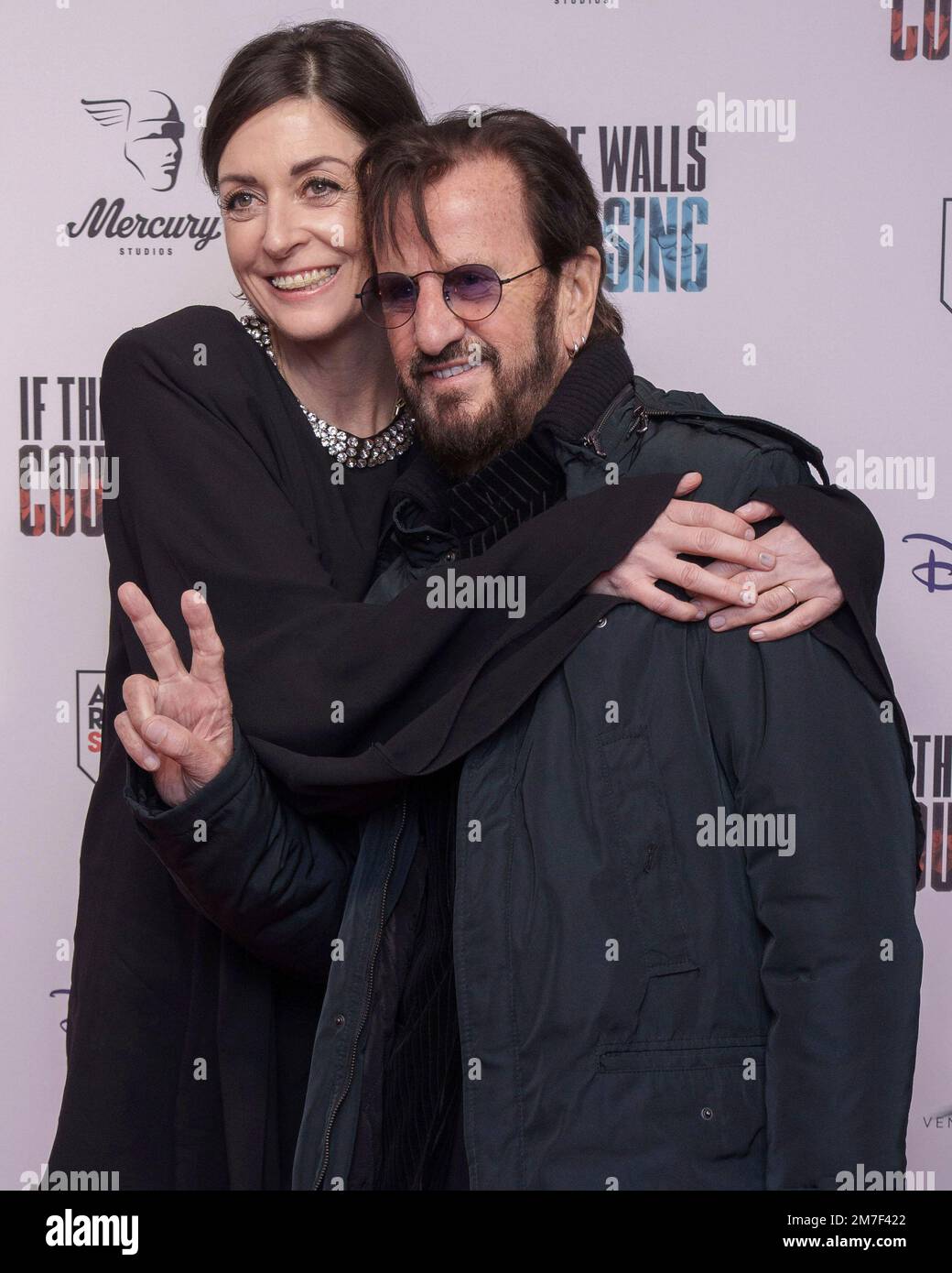 Mary McCartney, left and Ringo Starr pose for photographers upon ...