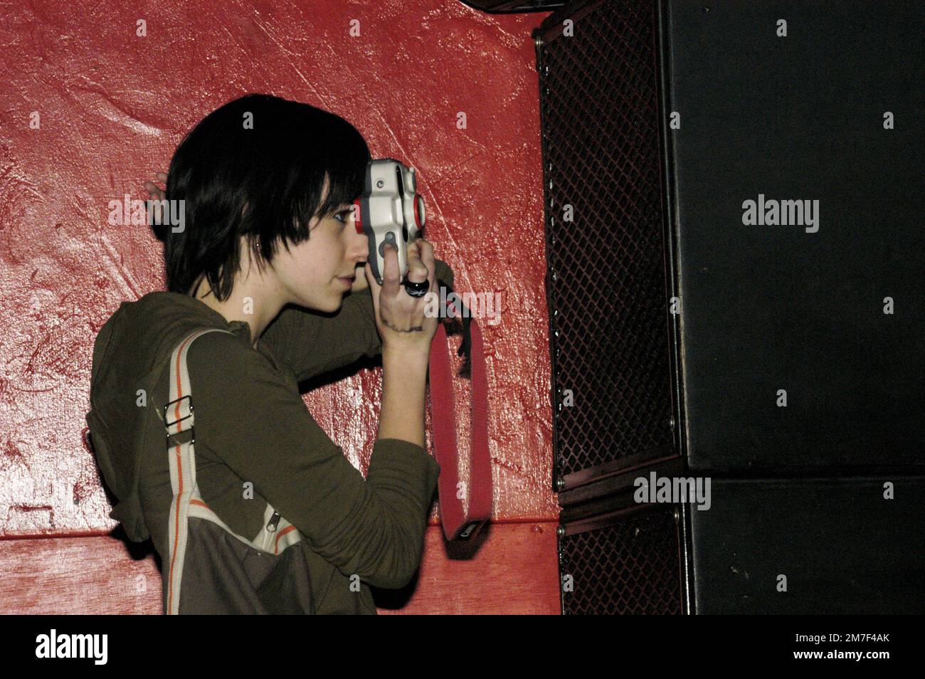 A girl photographs THE HOT PUPPIES at a gig at the Barfly in Cardiff ...