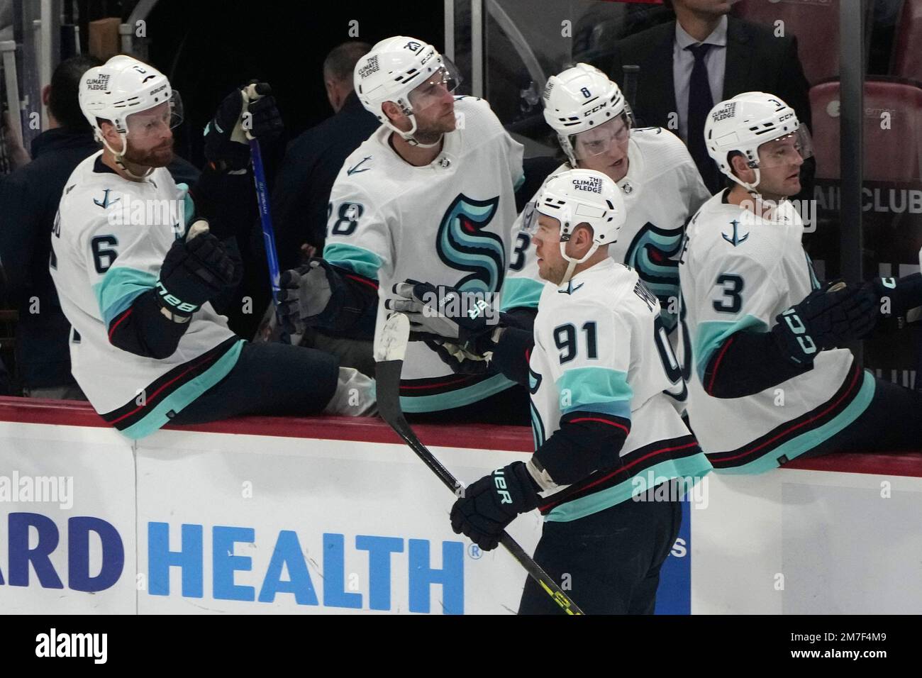 Seattle Kraken right wing Daniel Sprong (91) is congratulated after ...