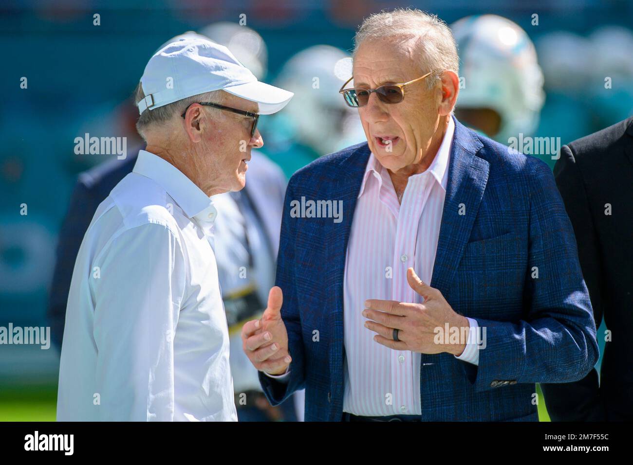 Miami Dolphins owner Stephen Ross (right) talks with New York Jets ...