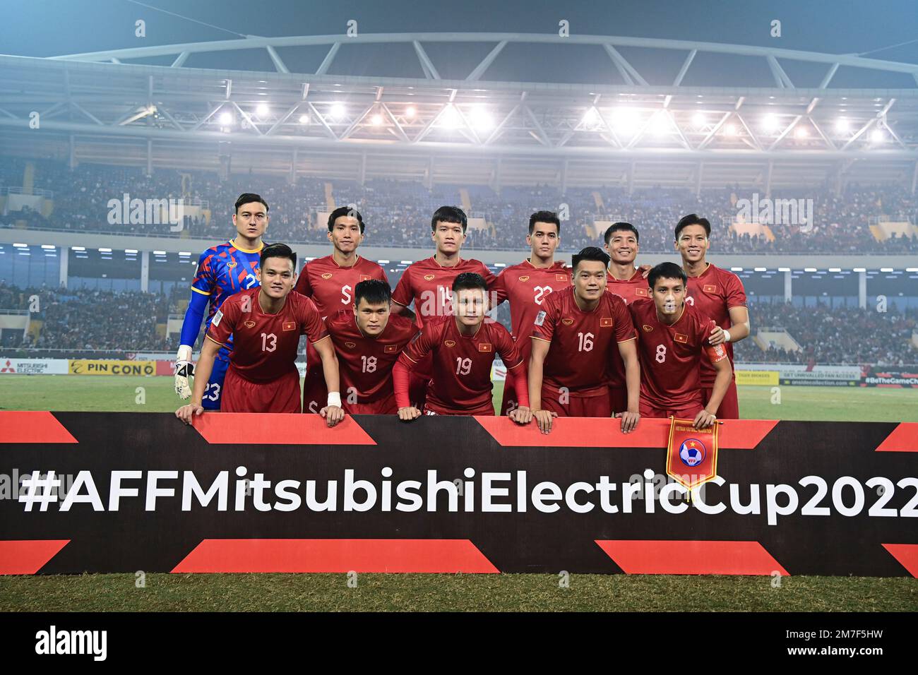 Vietnam's players pose for a photo ahead of their first leg of the ...