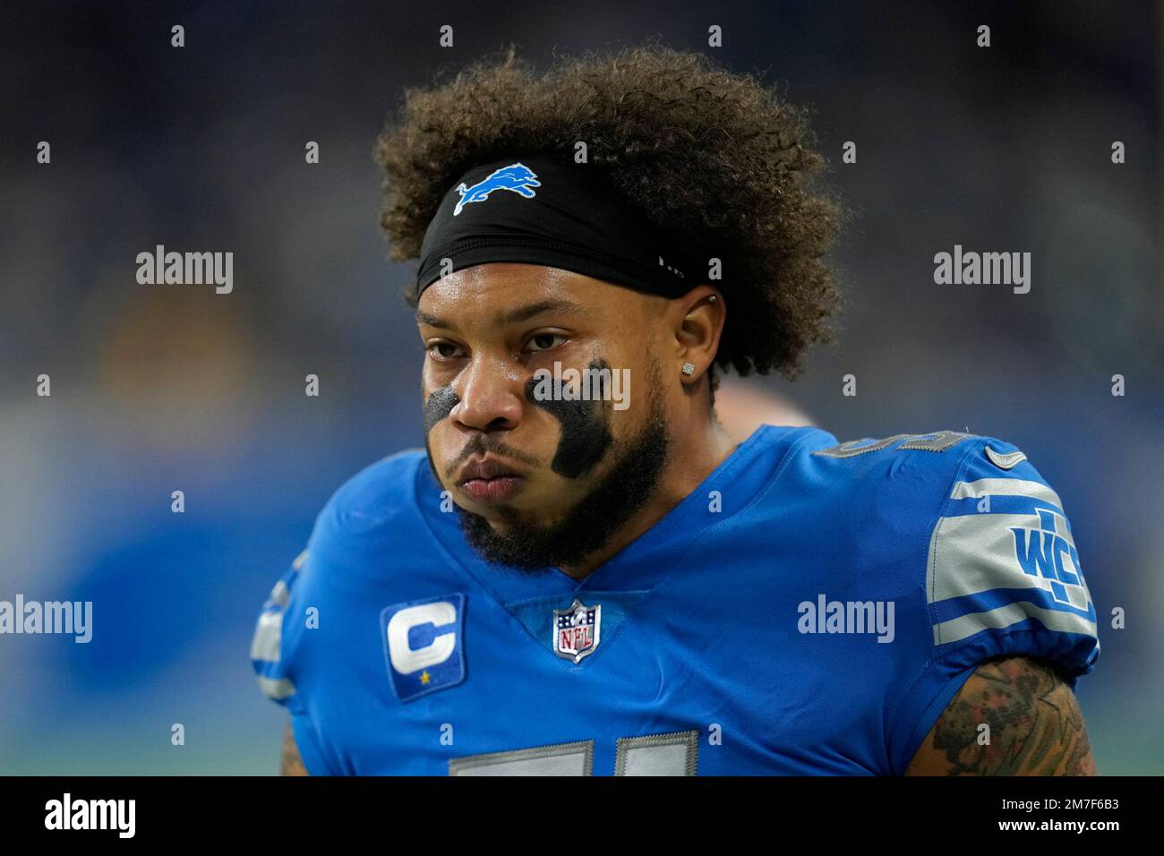 Detroit Lions linebacker Josh Woods (51) runs on the field before an ...