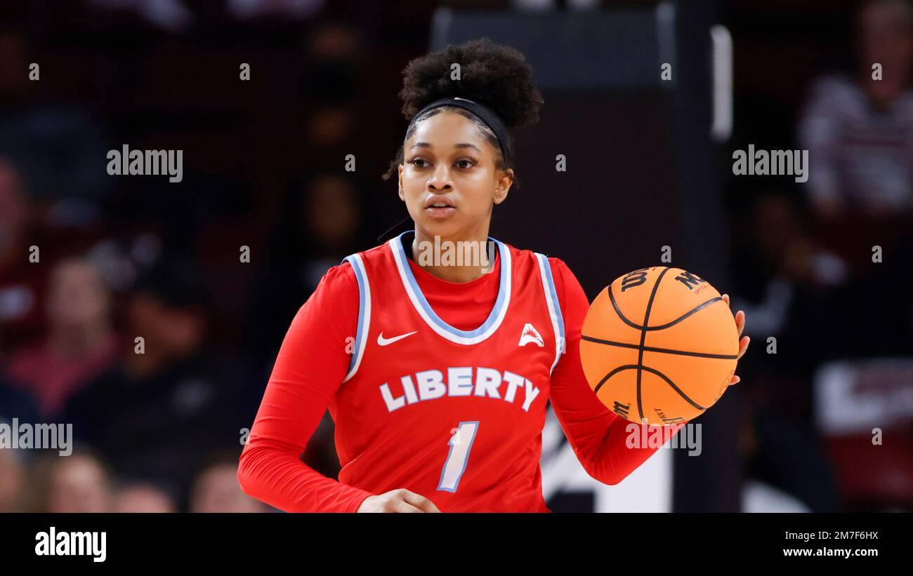 Liberty guard Kennedi Williams brings the ball up court during the ...