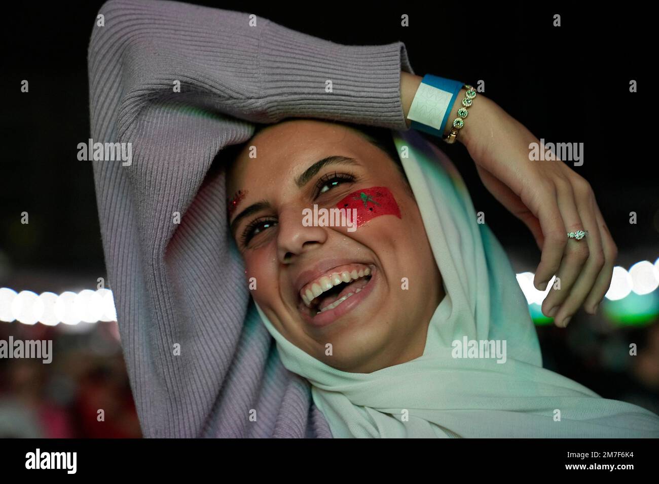 FILE - A Moroccan fan celebrates after their team scored the first goal ...