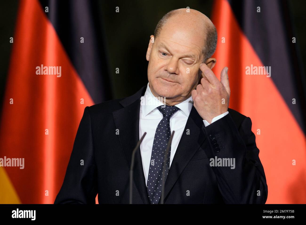 German Chancellor Olaf Scholz gestures as he briefs the media after a ...