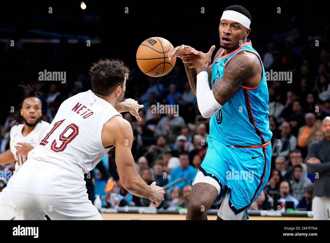 Phoenix Suns' Torrey Craig, right, loses the ball as Cleveland ...