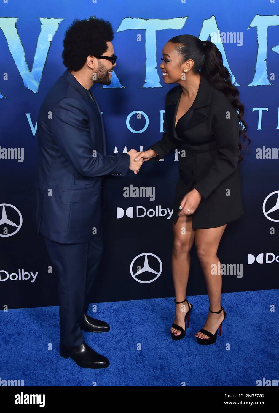 The Weeknd, left, and H.E.R. arrive at the U.S. premiere of "Avatar ...