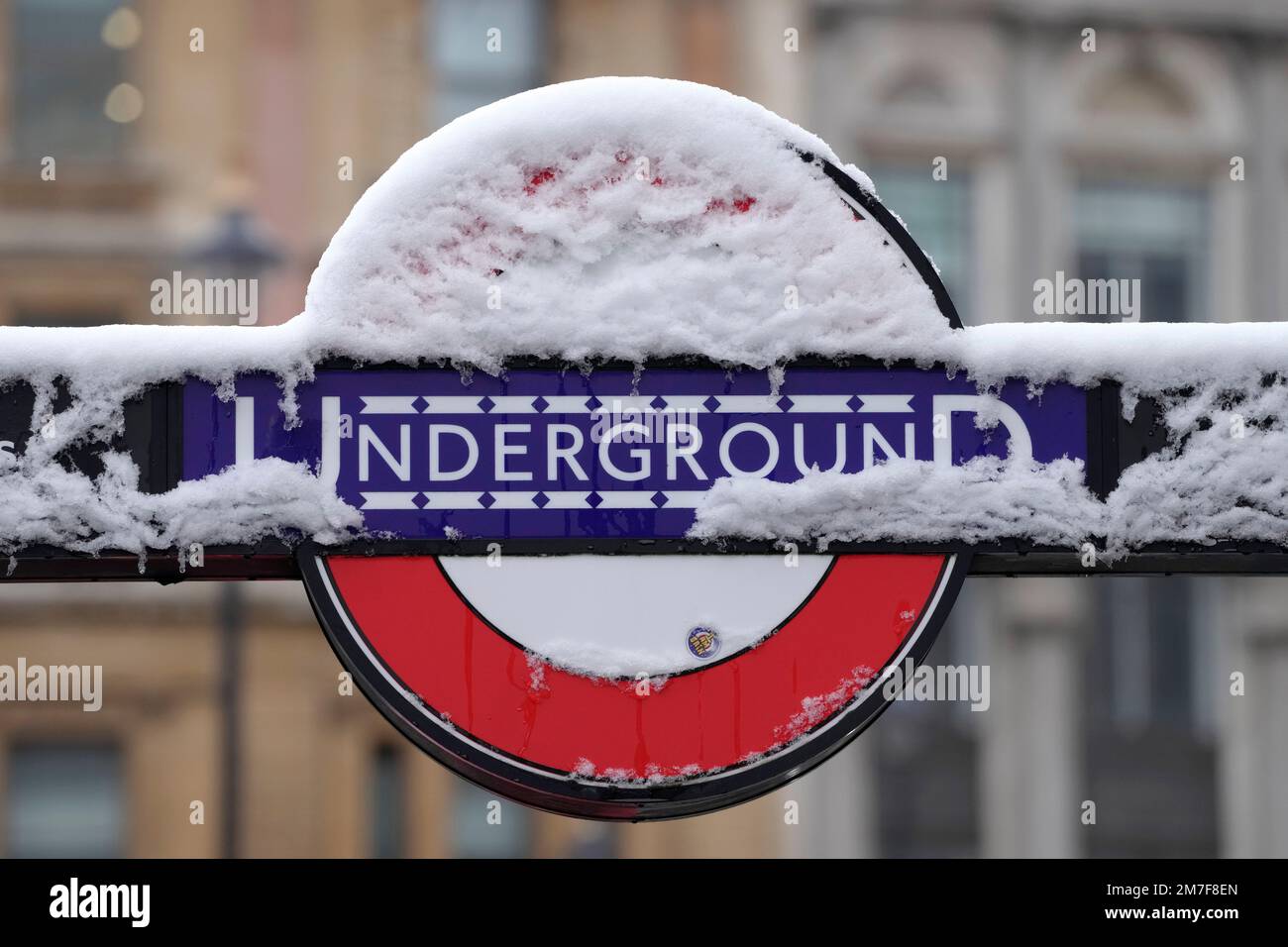 A snow covered Underground sign in London, Monday, Dec. 12, 2022. Snow ...