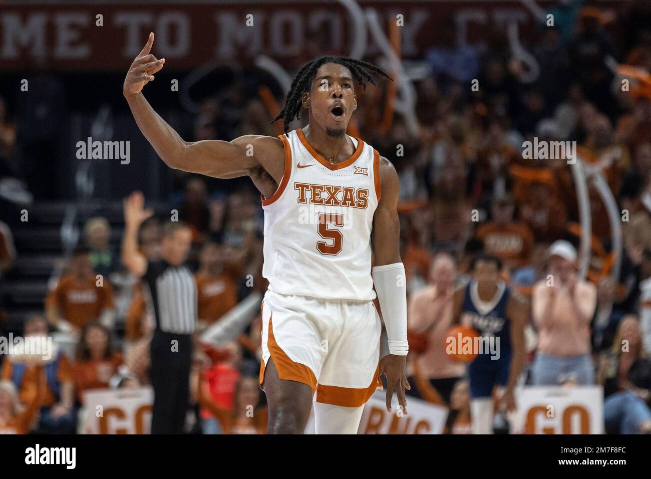 Texas guard Marcus Carr celebrates a three-point shot against Rice ...