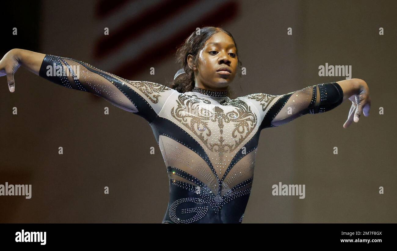 Georgia's JaFree Scott competes on the balance beam during an NCAA ...