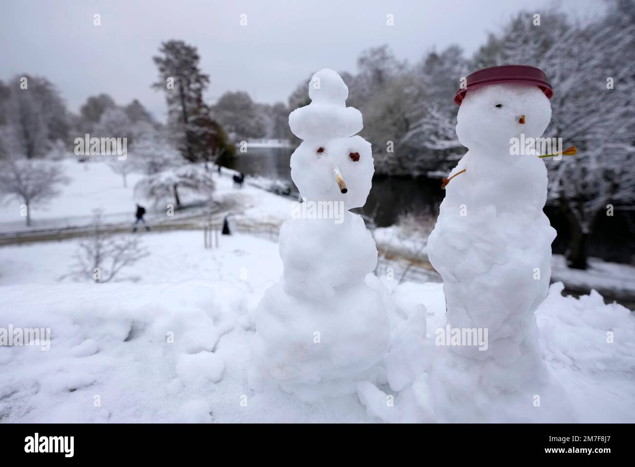 Snowmen on a wall overlooking St James's Park in London, Monday, Dec.12 ...