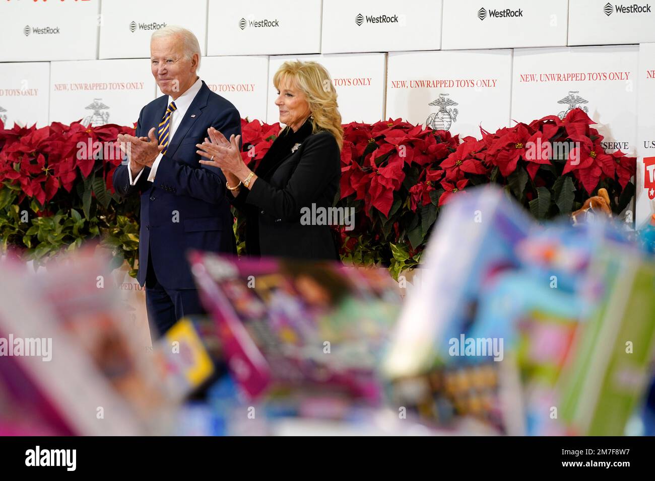 President Joe Biden and first lady Jill Biden participate in a Toys for ...
