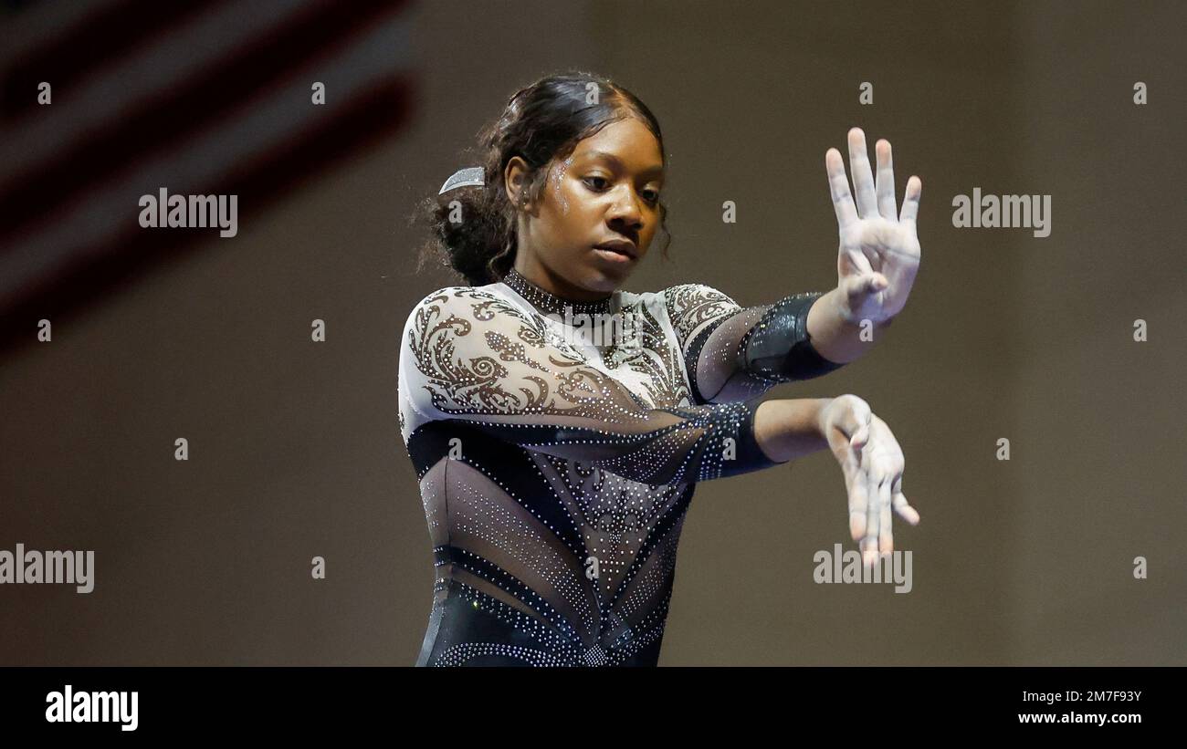 Georgia's JaFree Scott competes on the balance beam during an NCAA ...