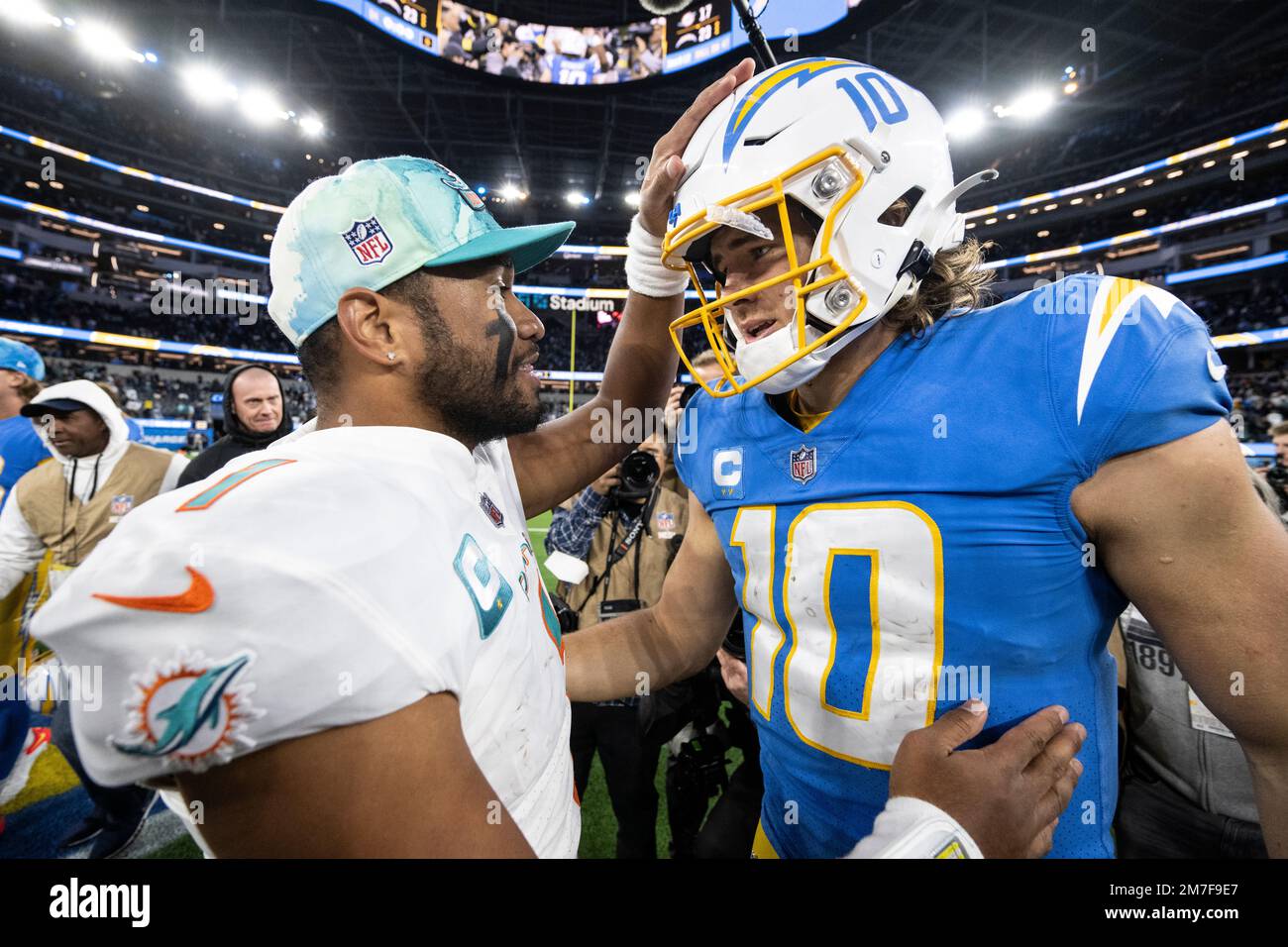 Miami Dolphins quarterback Tua Tagovailoa (1) and Los Angeles Chargers ...