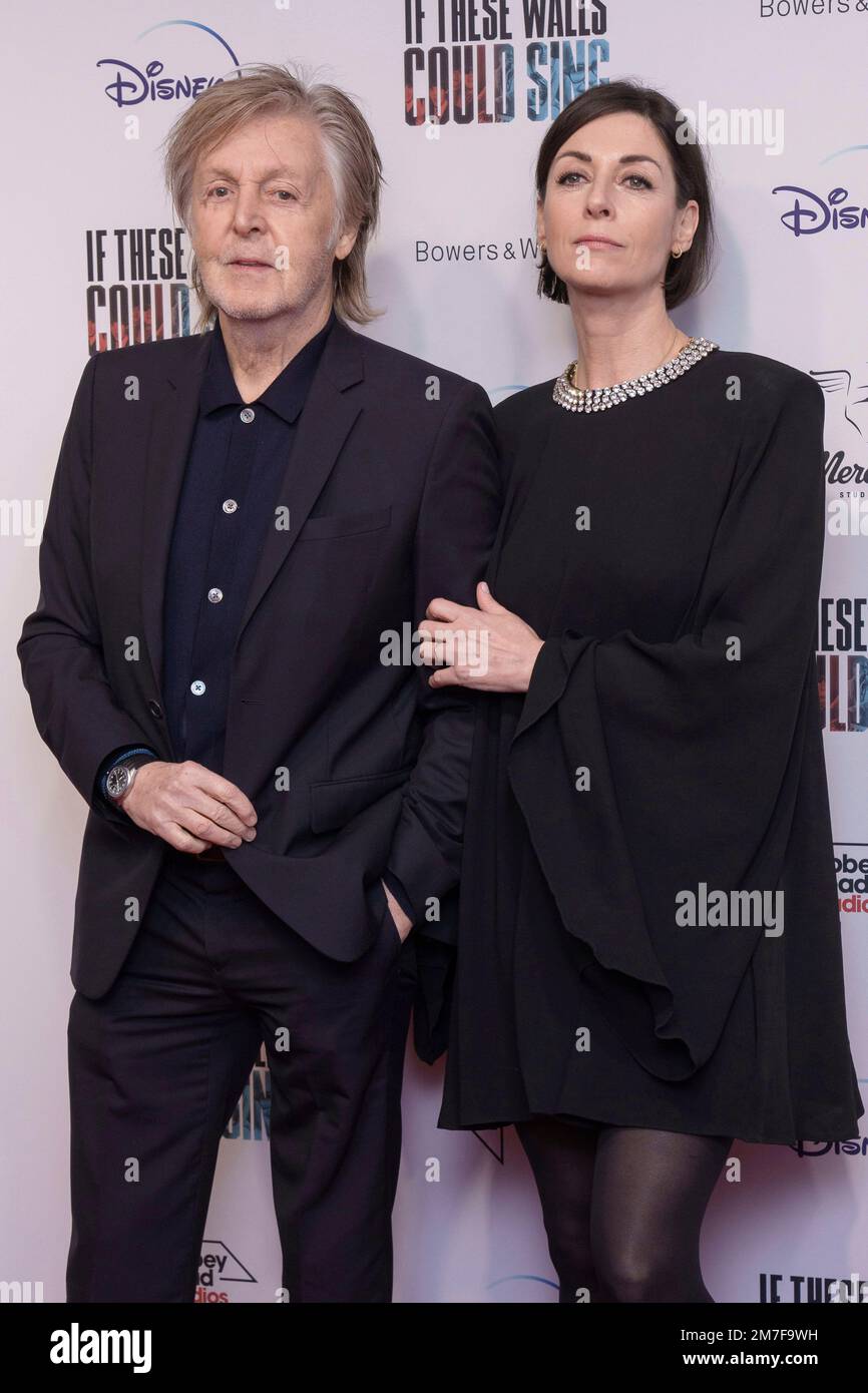 Paul McCartney, left, and Mary McCartney pose for photographers upon ...