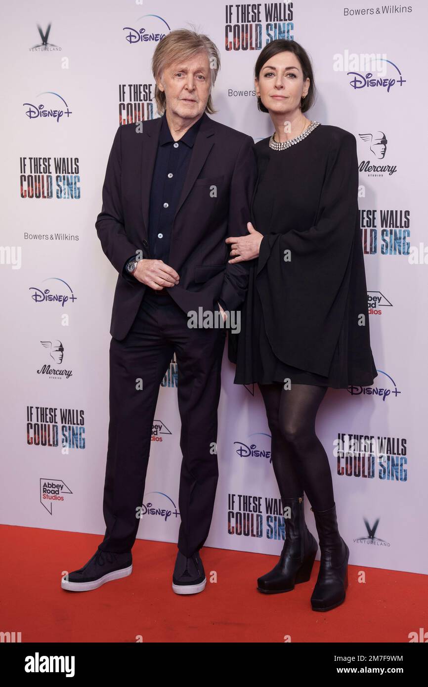 Paul McCartney, left, and Mary McCartney pose for photographers upon ...