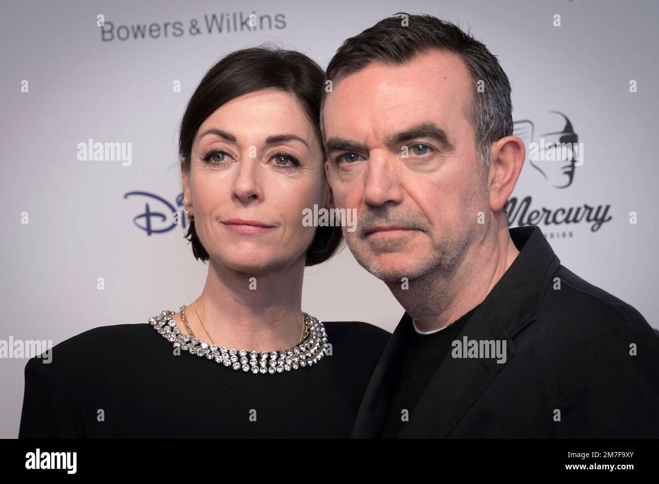 Mary McCartney, left, and Simon Aboud pose for photographers upon ...