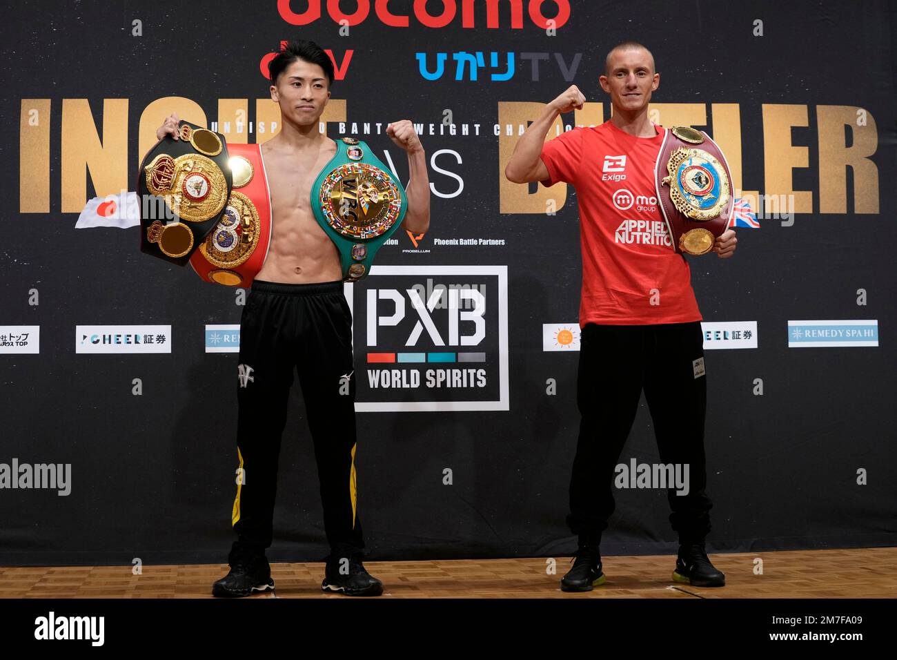 Japan's Naoya Inoue, left, and Britain's Paul Butler pose for a photo ...