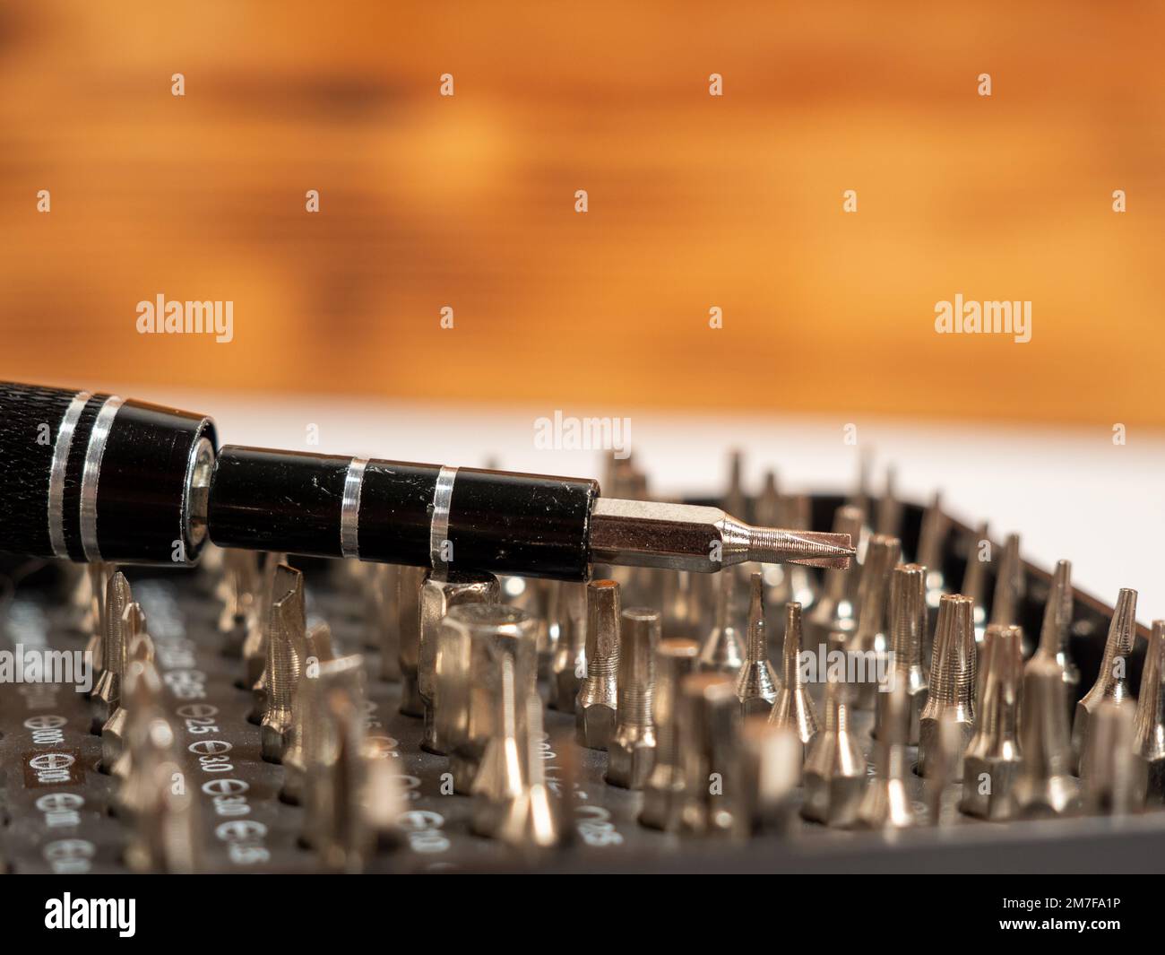 Universal set of screwdriver bits with different bits. Close-up bit set ...