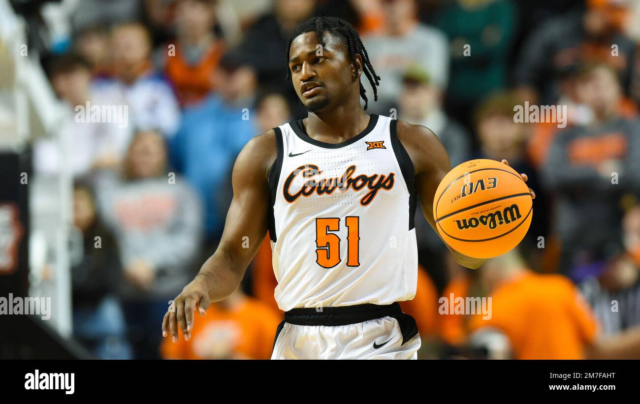 Oklahoma State guard John-Michael Wright (51) brings the ball down ...