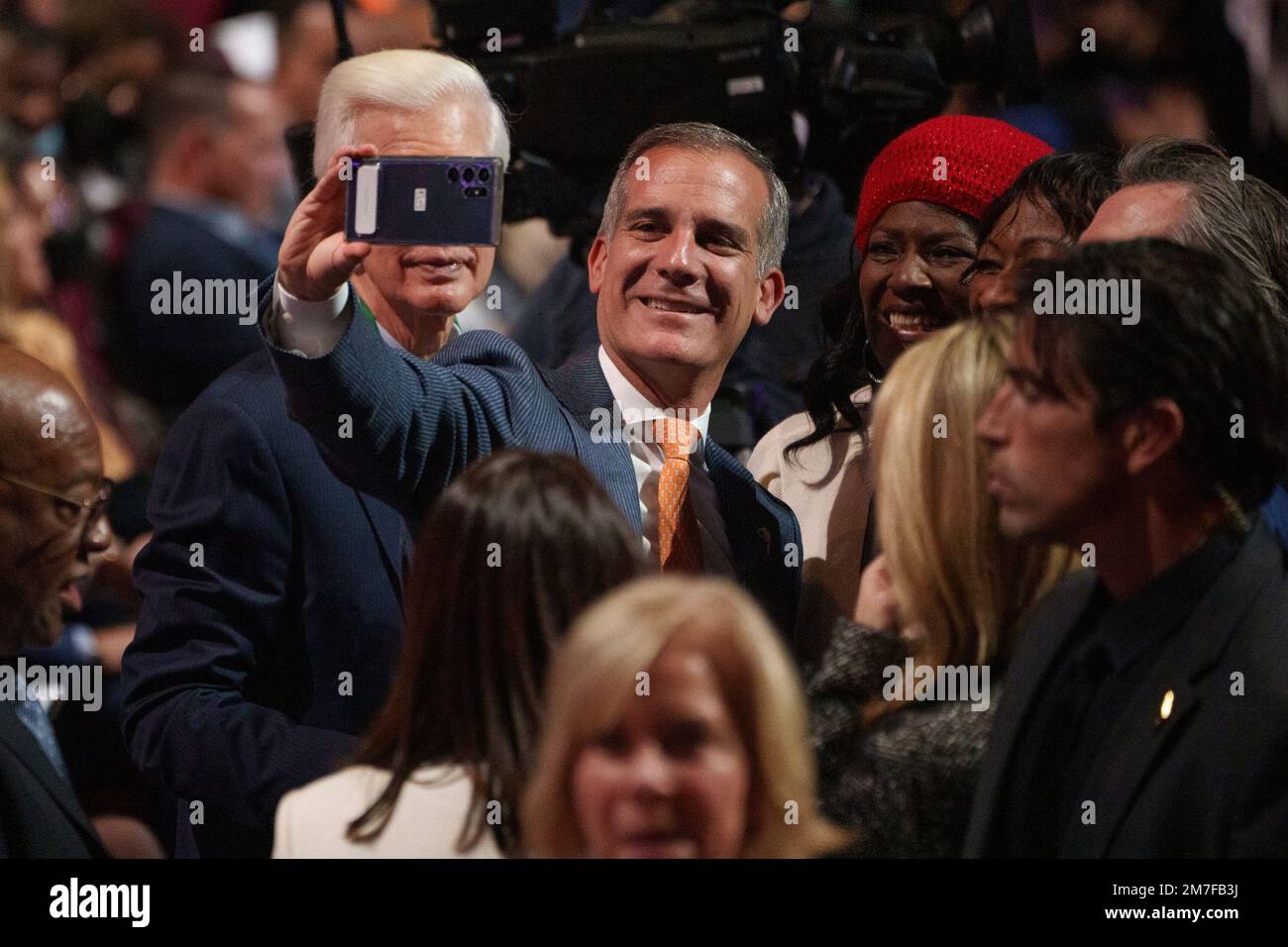 Outgoing Los Angeles Mayor Eric Garcetti, middle, and former California ...