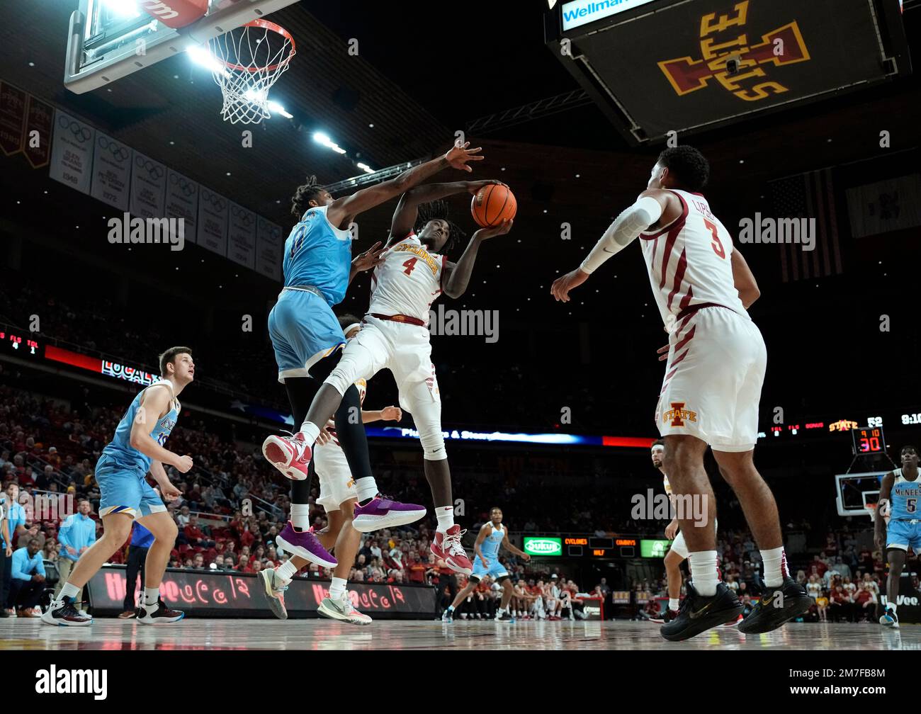 Iowa State guard Demarion Watson (4) pulls down a rebound past McNeese ...