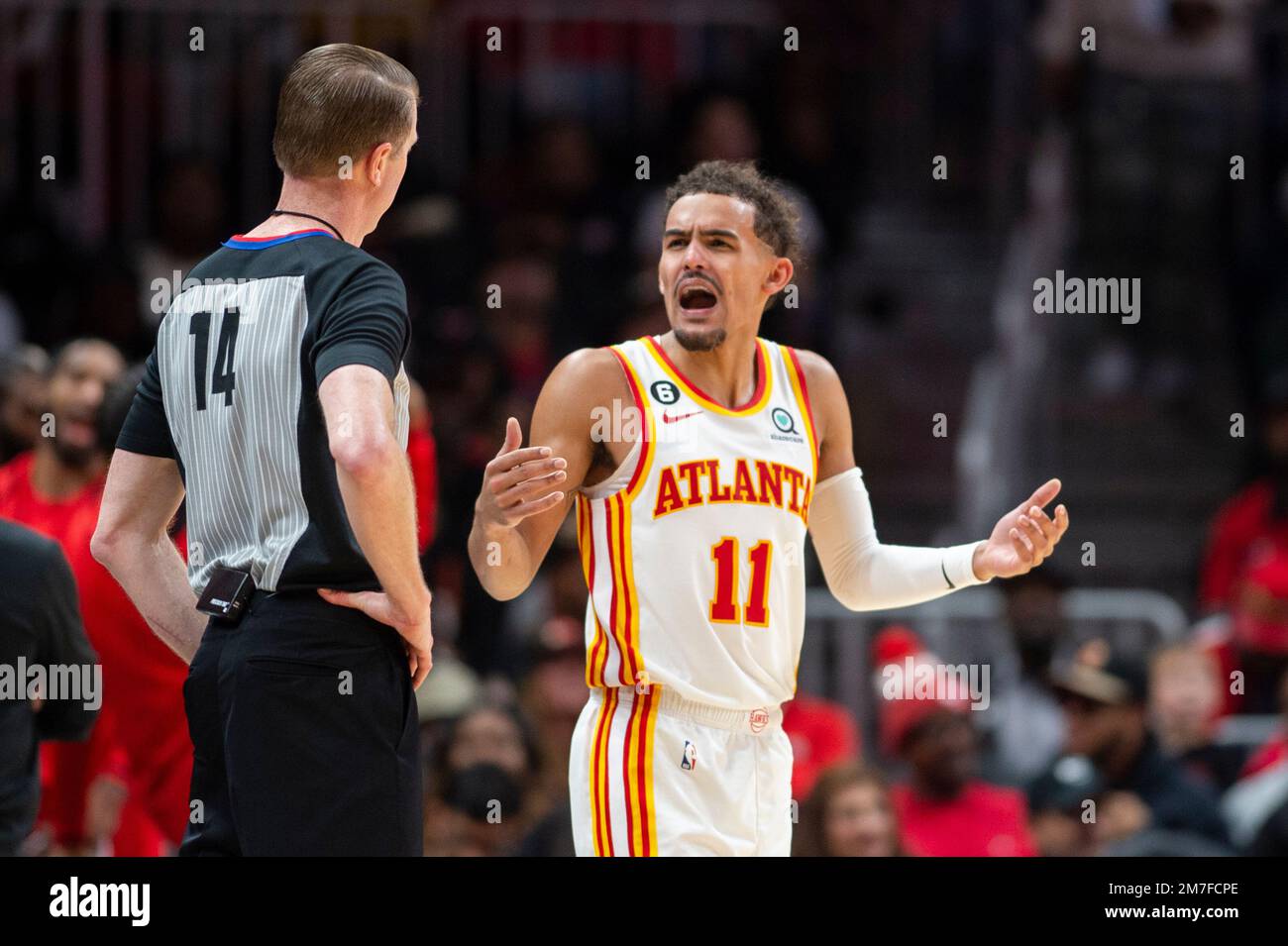 Atlanta Hawks guard Trae Young (11) yells at referee Ed Malloy (14 ...