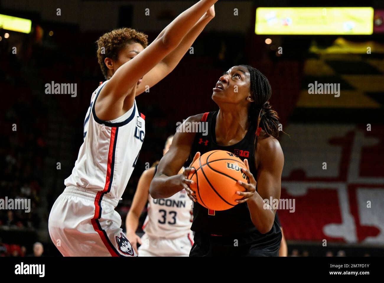 Maryland guard Diamond Miller, right, looks to shoot against ...
