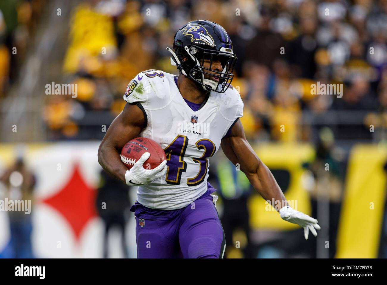 Baltimore Ravens running back Justice Hill (43) returns a kickoff ...